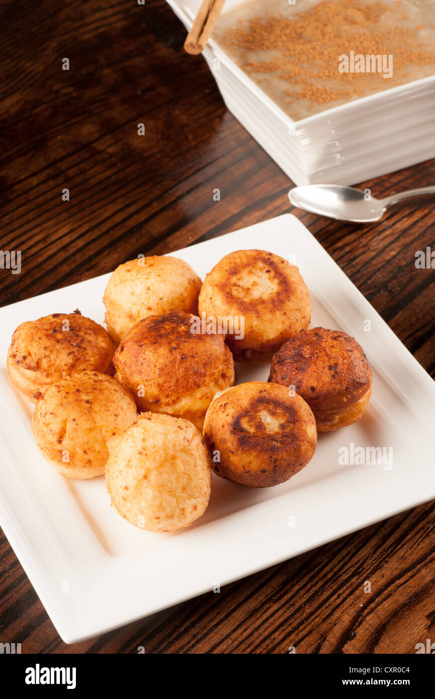 Traditional Colombian Christmas bunuelos served with natilla Stock ...