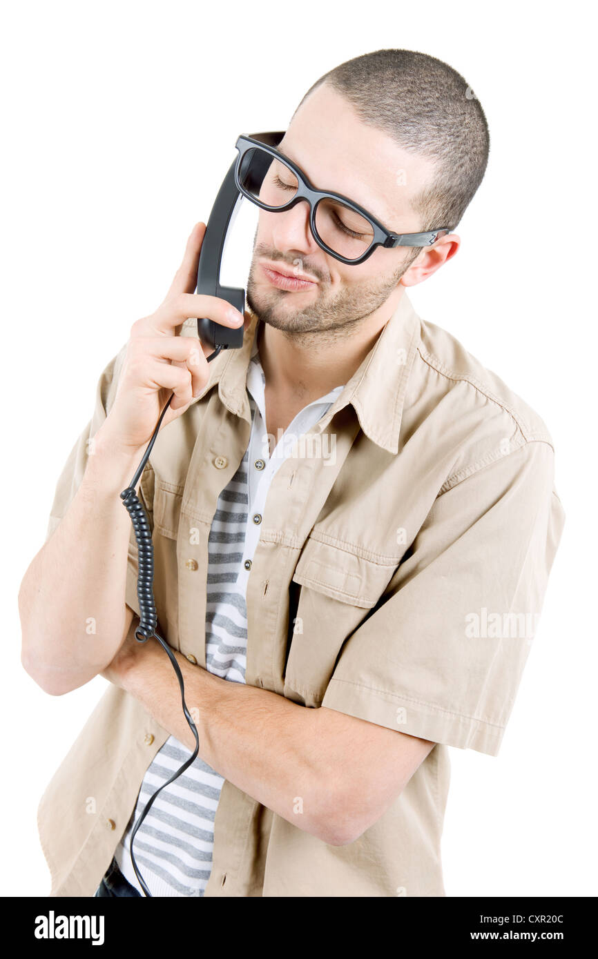 young man with a phone, isolated on white Stock Photo - Alamy
