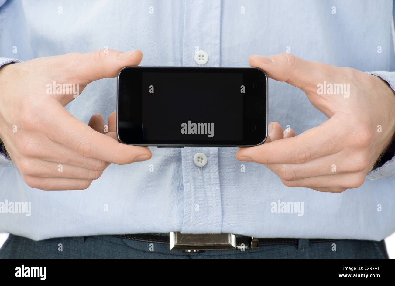 Hands holding mobile isolated on white Stock Photo - Alamy