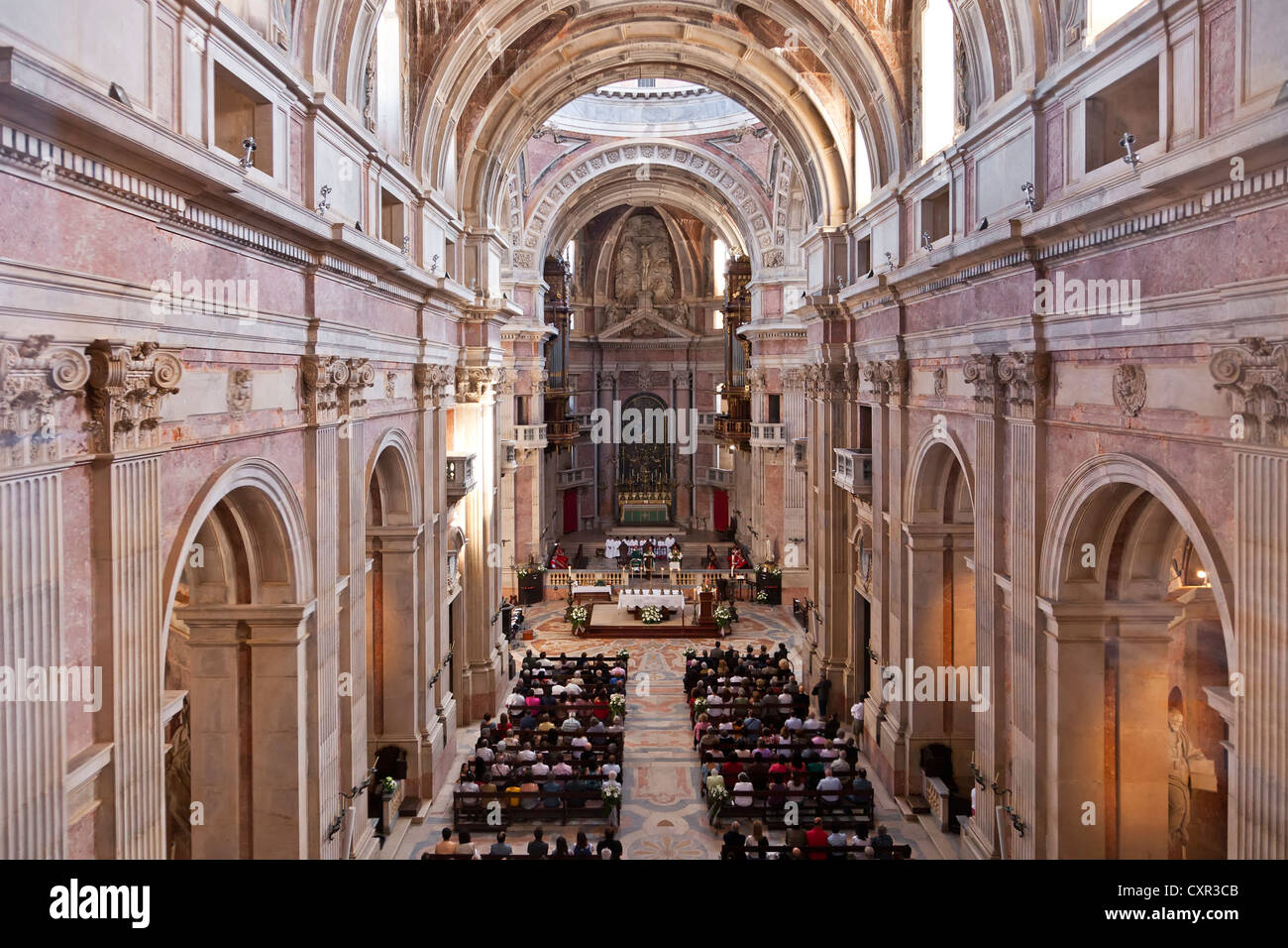 Basilica of the Mafra Palace filled with faithful during the Mass ...