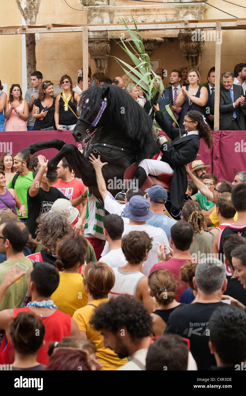 Lady riding black menorquin stallion hi-res stock photography and ...