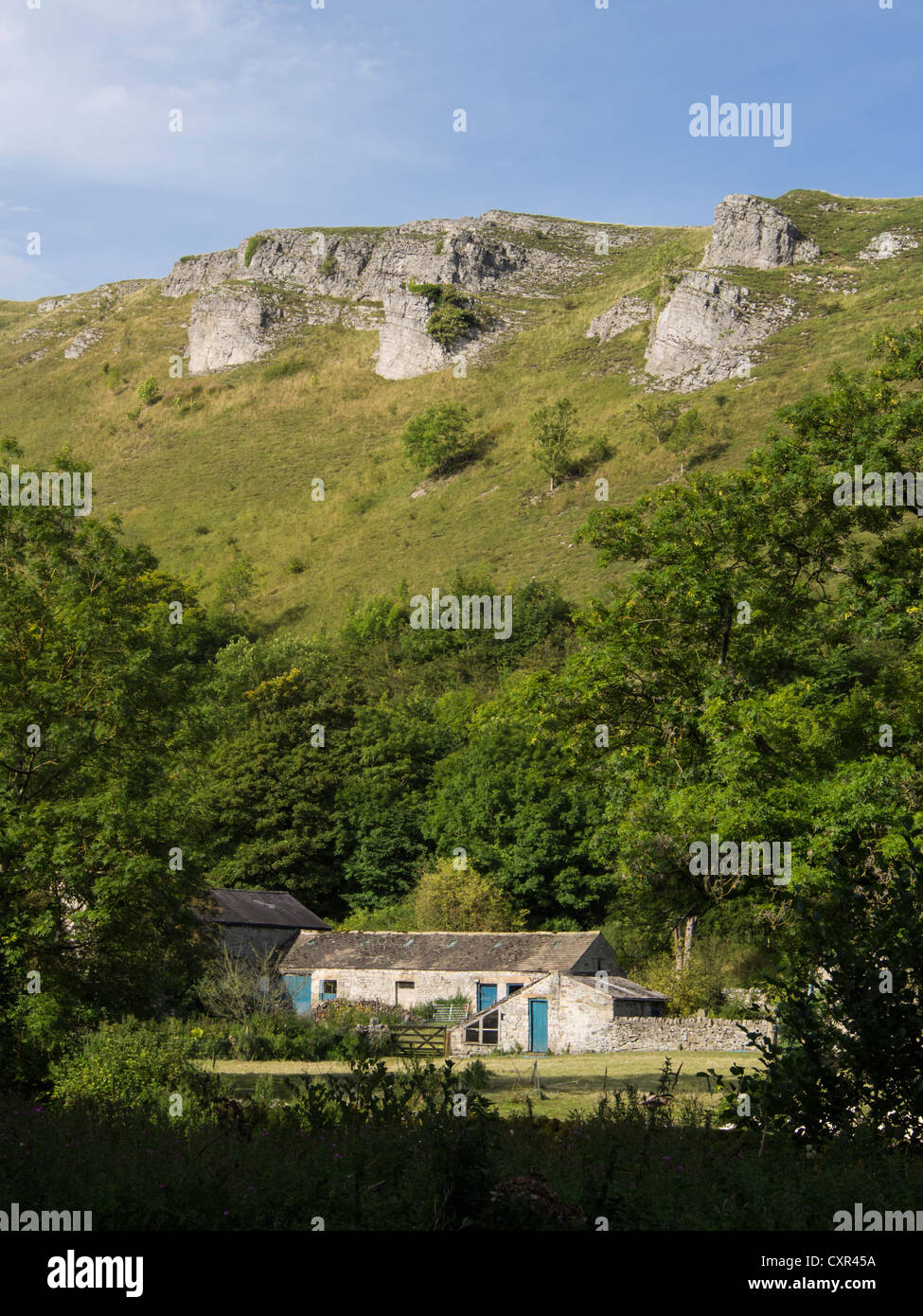farm buildings below Monsal Dale valley in Derbyshire Peak District ...