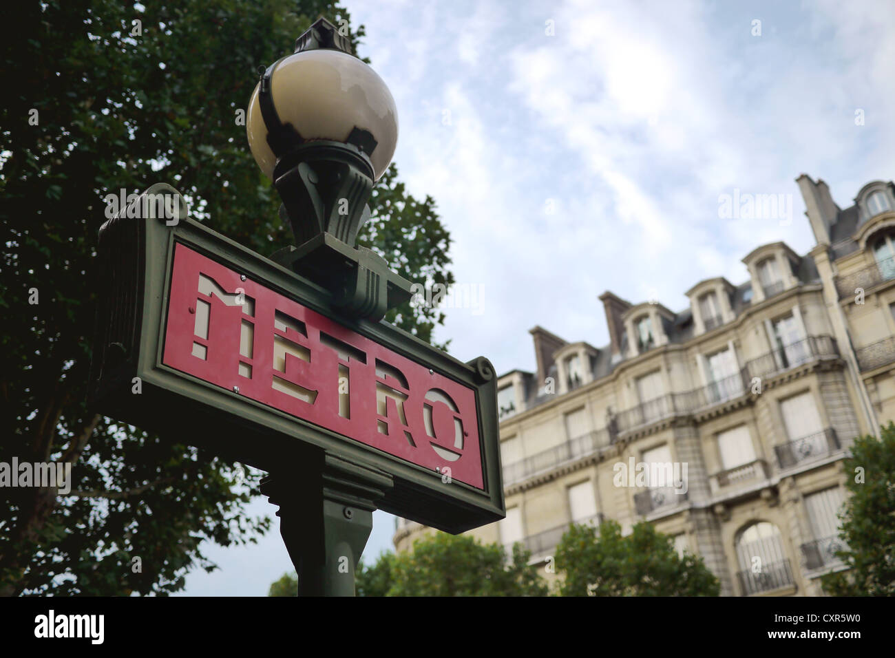 metro sign in paris and typical architecture Stock Photo - Alamy