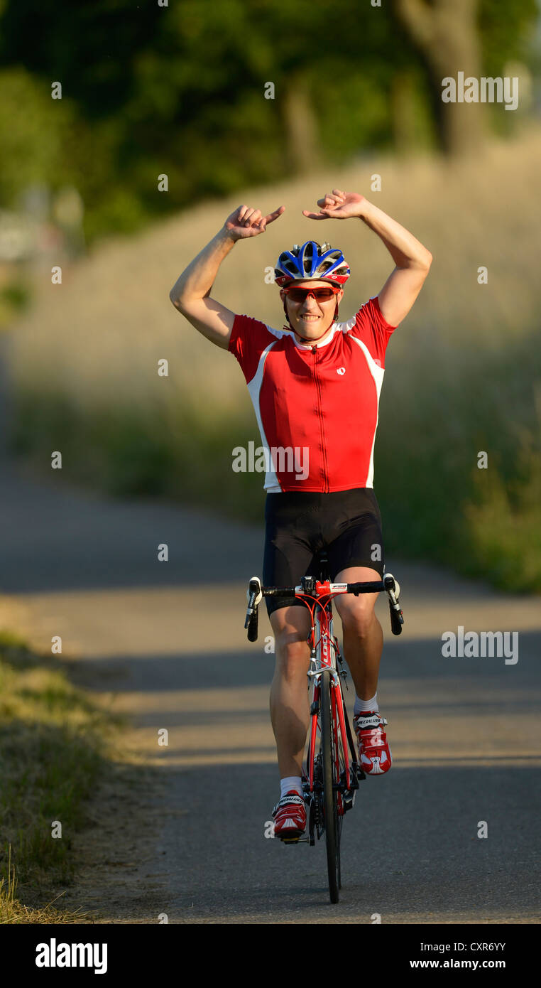 Cyclist, victory pose, cheering, professional racing bike, Waiblingen ...