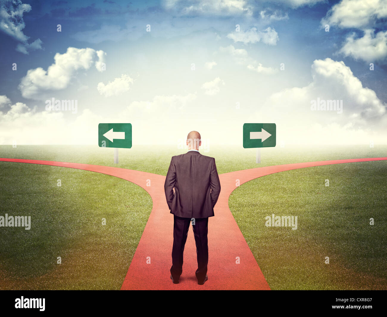 standing man and 2 way street Stock Photo - Alamy