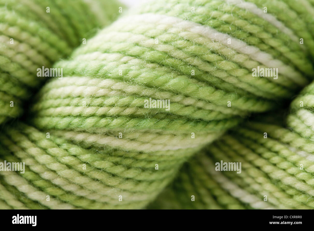 Detail of hank of green wool yarn Stock Photo - Alamy