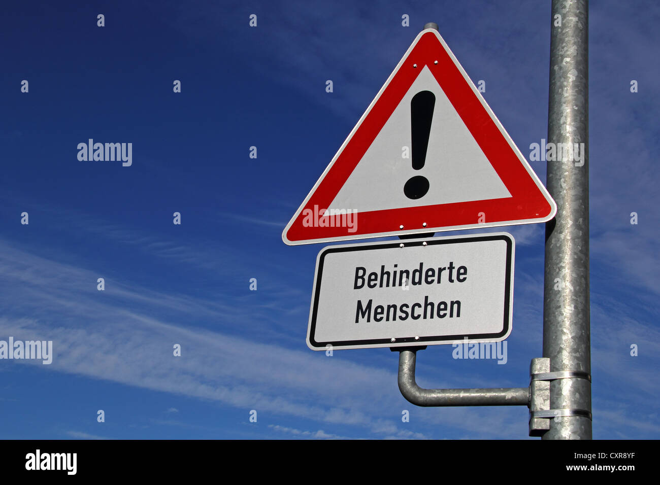 Road sign warning about disabled people Stock Photo - Alamy