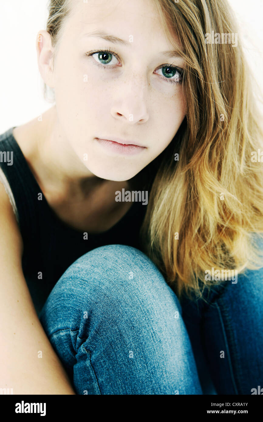 Young woman, seated Stock Photo - Alamy