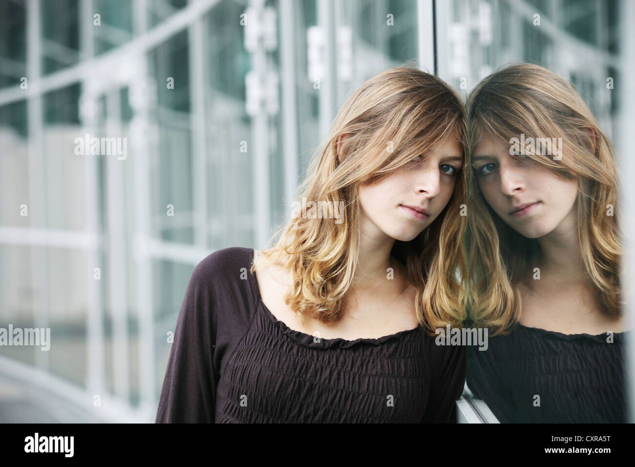 Young woman, portrait, reflection in glass Stock Photo - Alamy