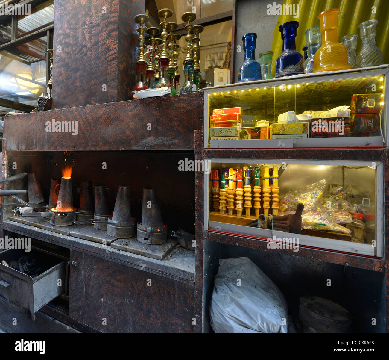 Old-fashioned firing of coal, hookah coal, for shisha, shishas, Old ...