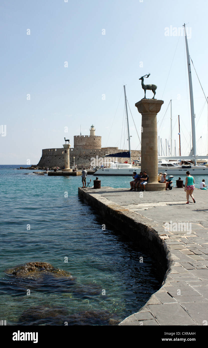 THE ENTRANCE TO MANDRAKI HARBOUR ON THE GREEK ISLAND OF RHODES Stock ...