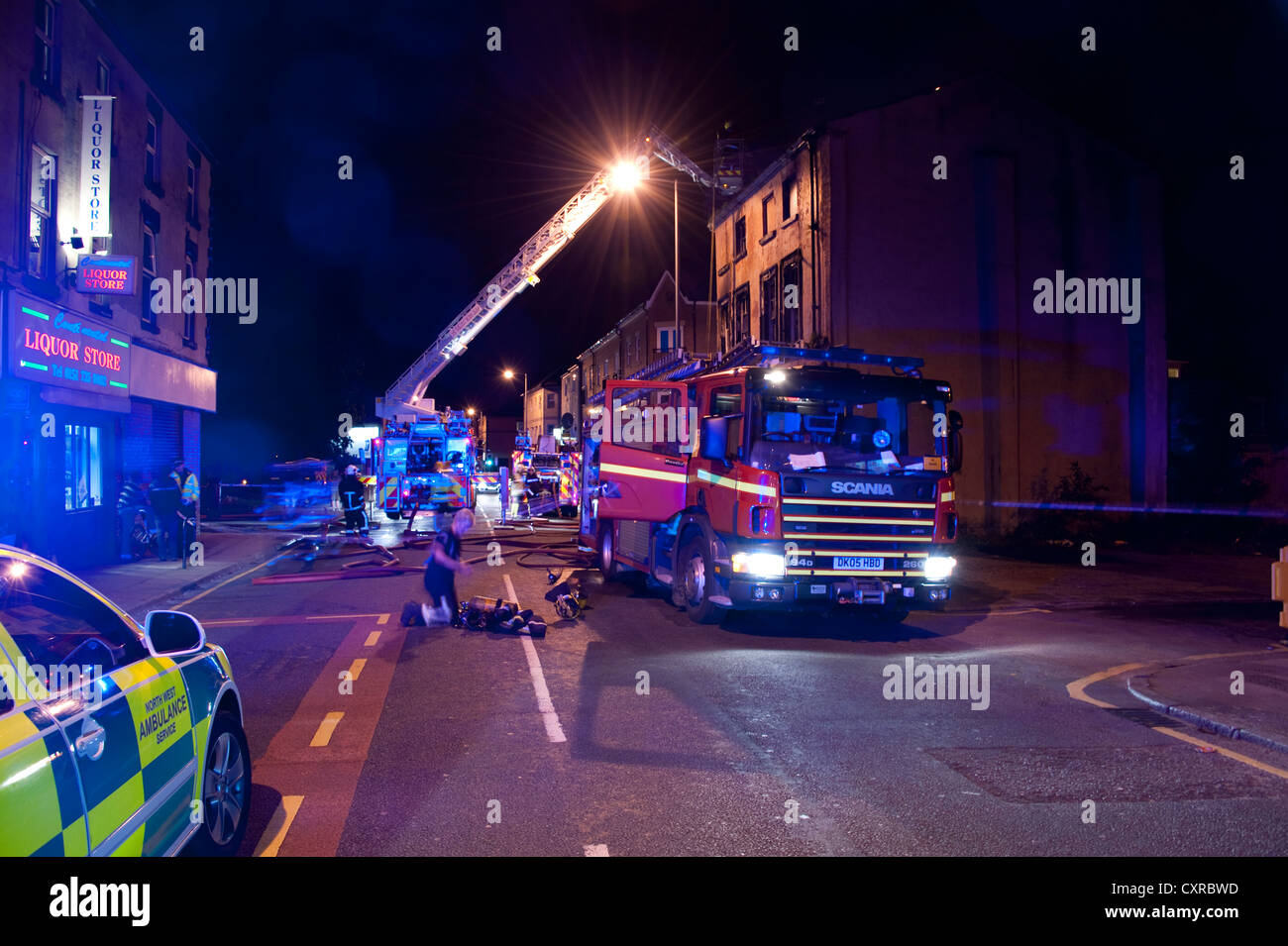 Large building on fire at night UK Firefighters Stock Photo - Alamy