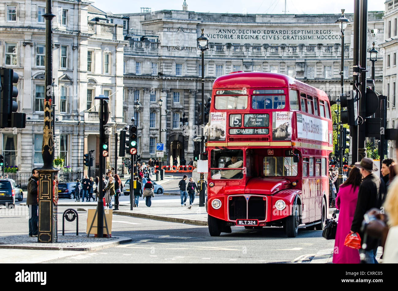 Red double-decker bus in traffic, London, South England, England ...