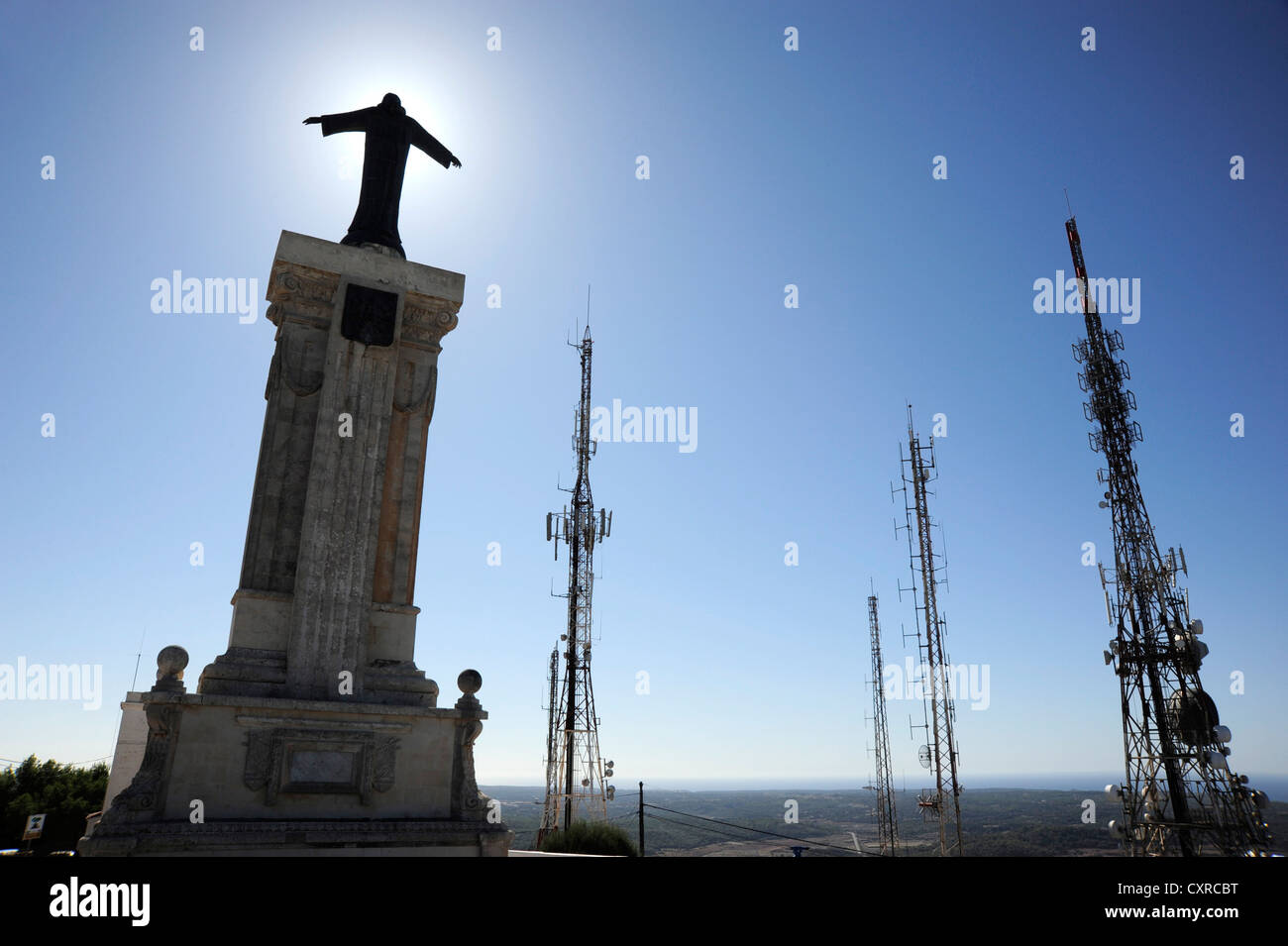 Christ statue between antenna masts on El Toro Mountain, Es Mercadal ...