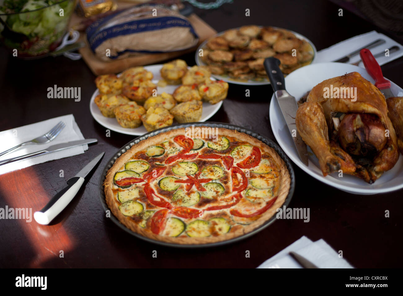 Spanish lunch table with chicken, flan and mini tortillas Stock Photo ...