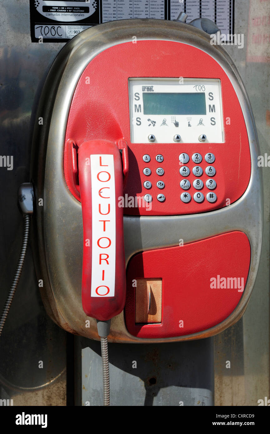 Red public telephone in Arenal d'en Castell, Minorca, Menorca, Balearic ...