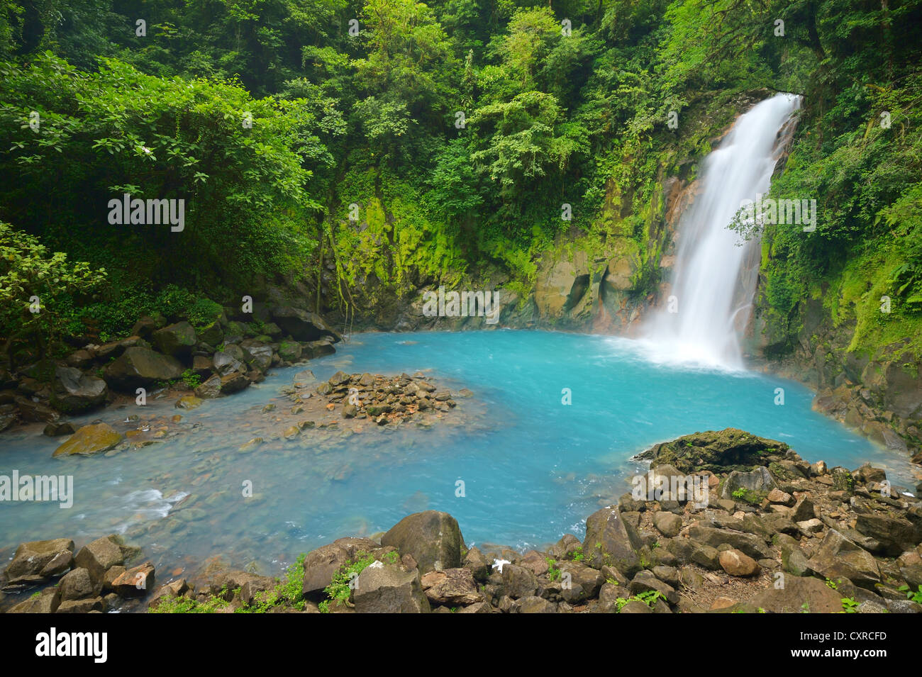 Waterfall at the light blue coloured river Rio Celeste, Tenorio Volcano ...
