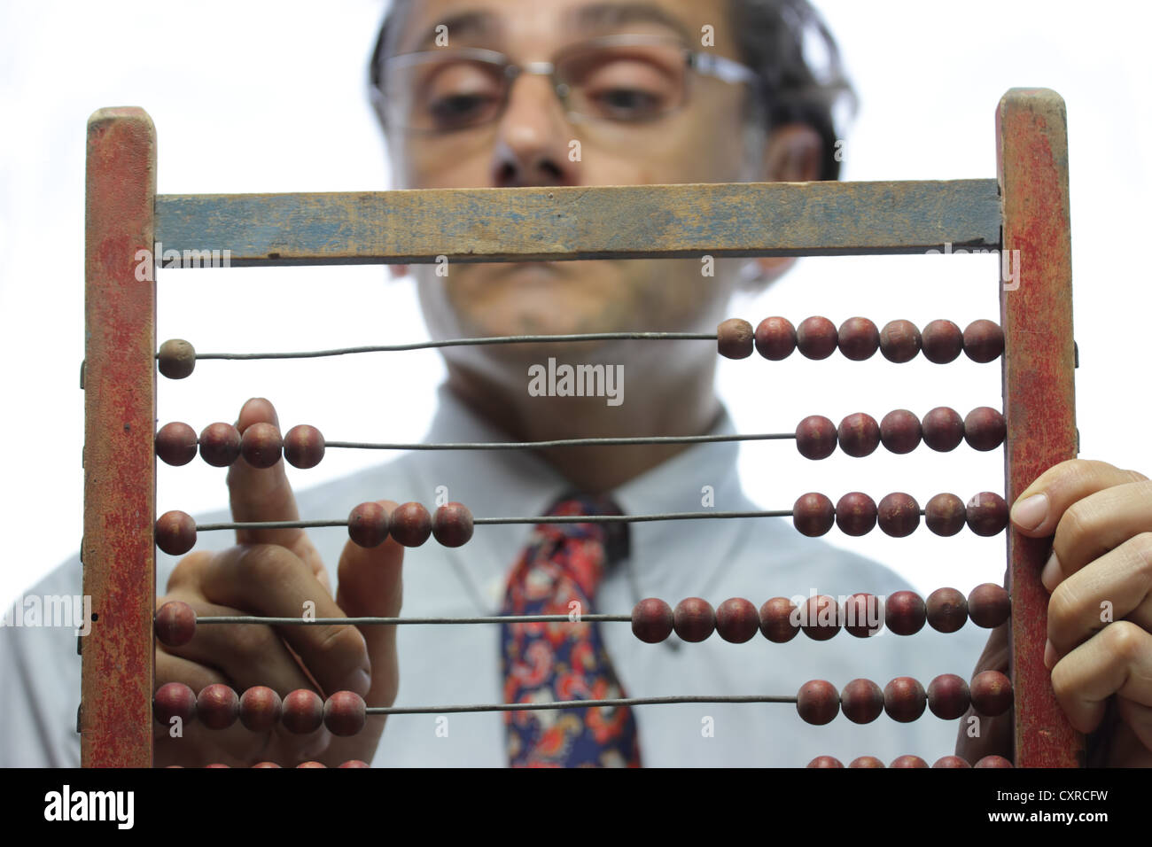 accountant with abacus over white background Stock Photo - Alamy