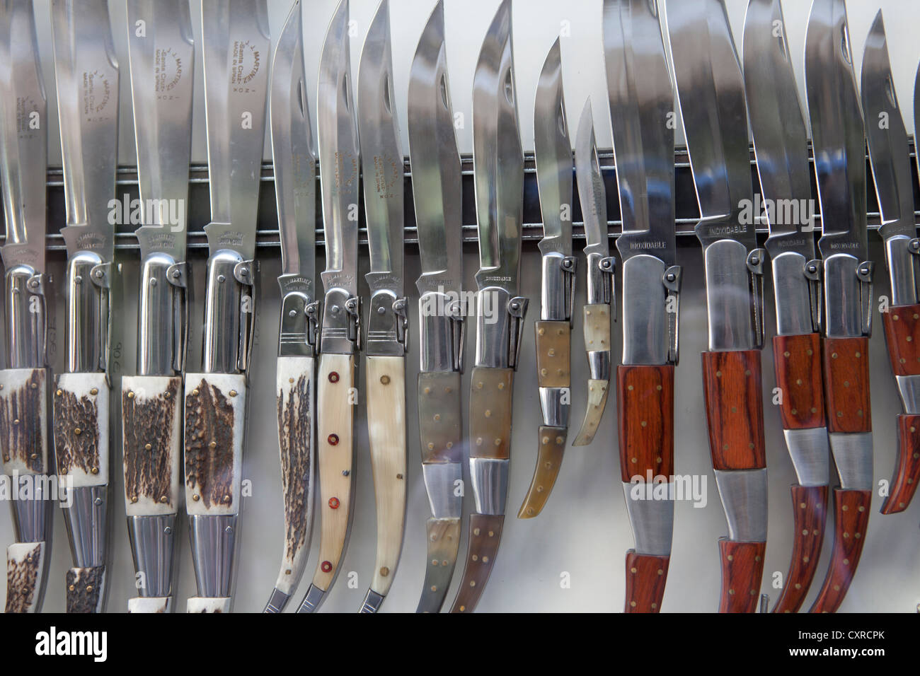 Knives in window display, Granada, Spain Stock Photo - Alamy