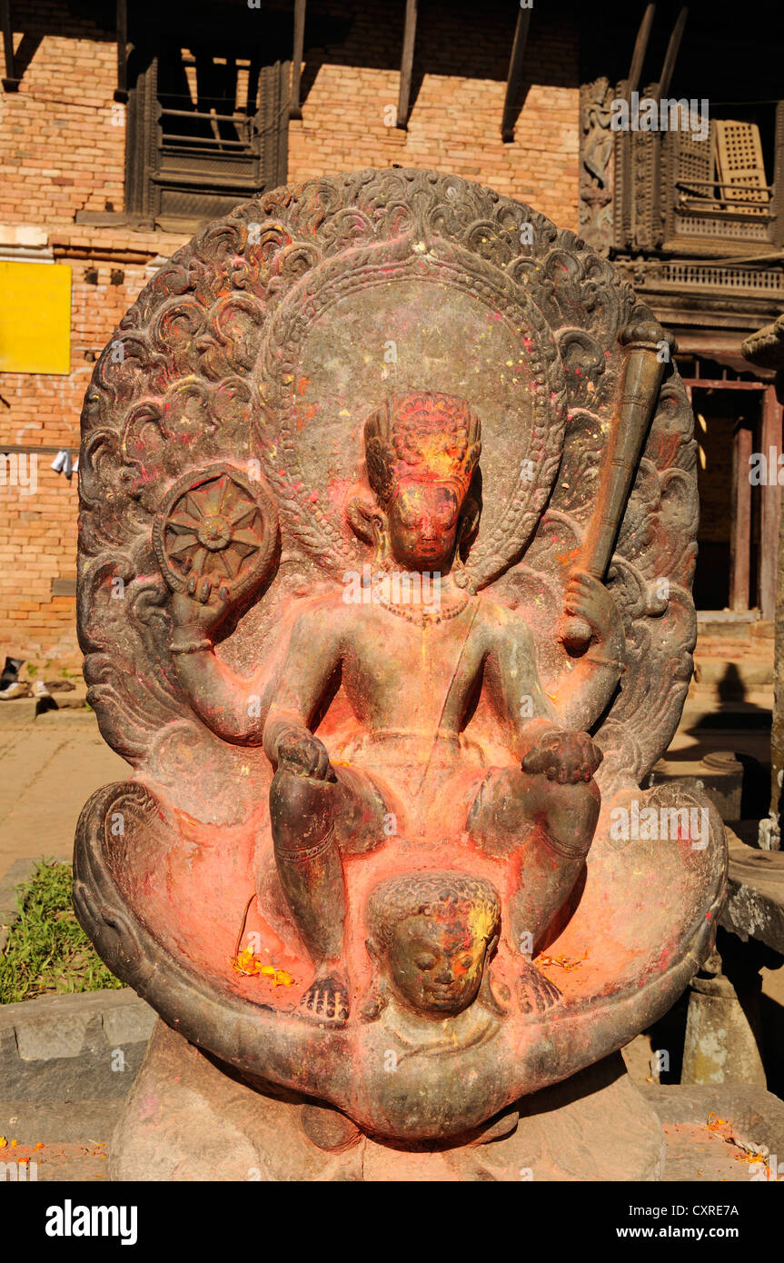 Statue of a temple guardian made of stone, Changu Narayan, a UNESCO ...