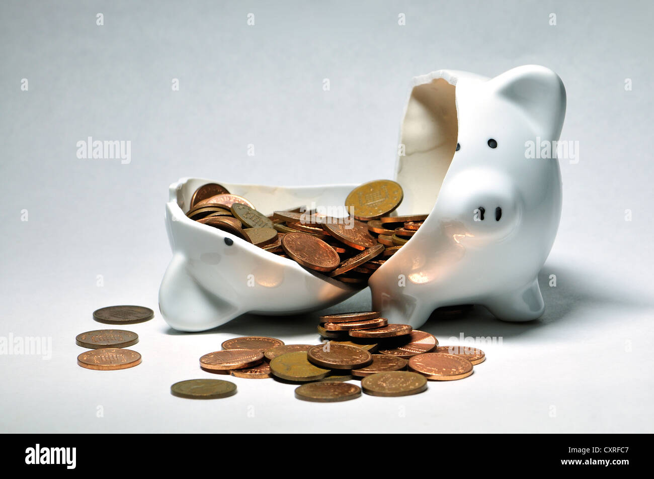 Broken piggy bank Stock Photo - Alamy
