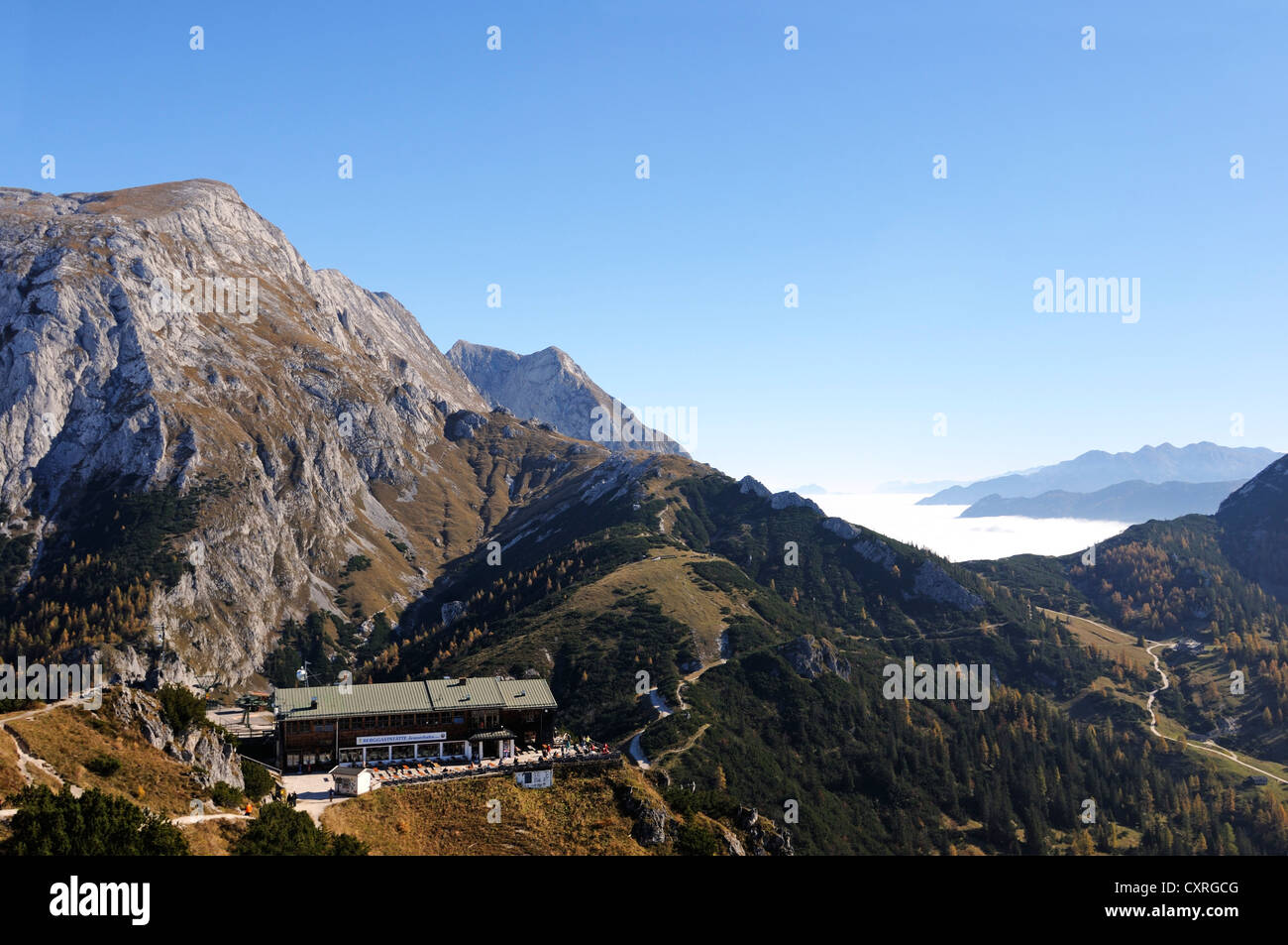 View of a misty valley as seen from Jenner mountain, district of ...