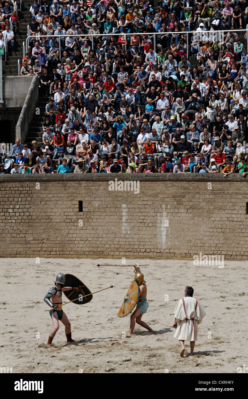 Gladiatorial show fight in an arena, Roman festival, Archaeological ...