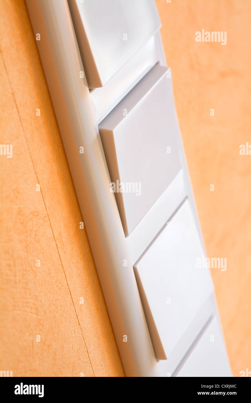 Close up of modern light switch Stock Photo - Alamy