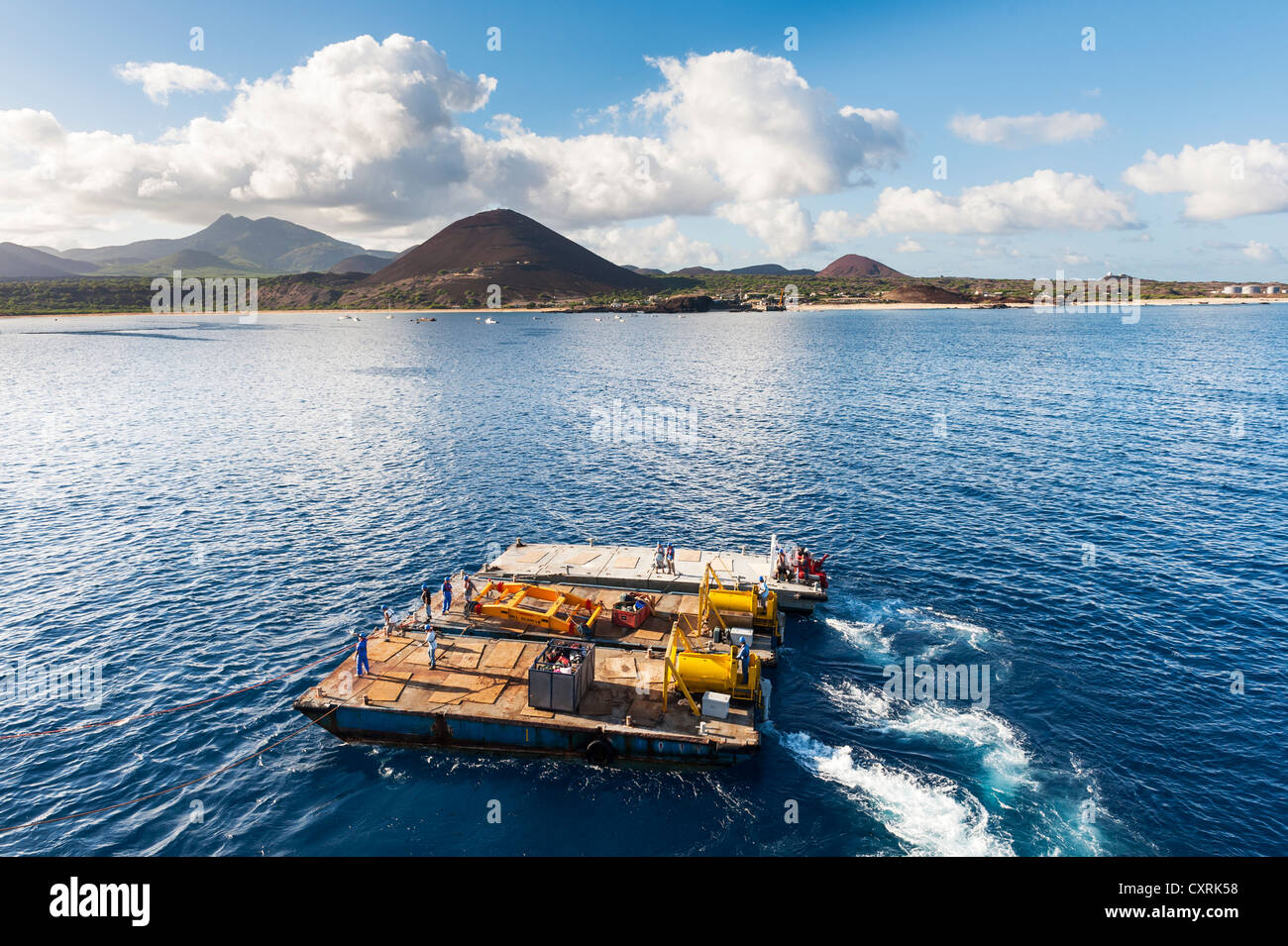 Motor barges collecting cargo from the RMS St Helena at Georgetown ...
