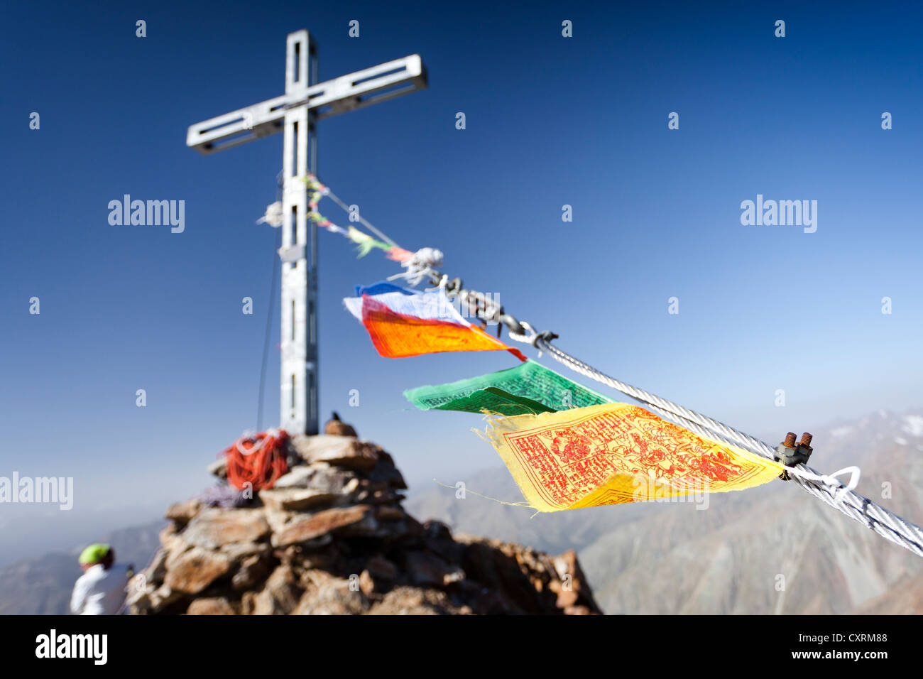 Summit cross of Similaun Mountain with prayer cloths near ...