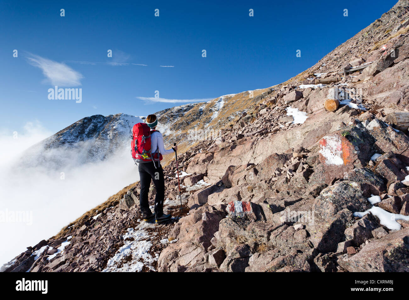 Hiker during the ascent to Grosse Laugenspitze Mountain above the ...