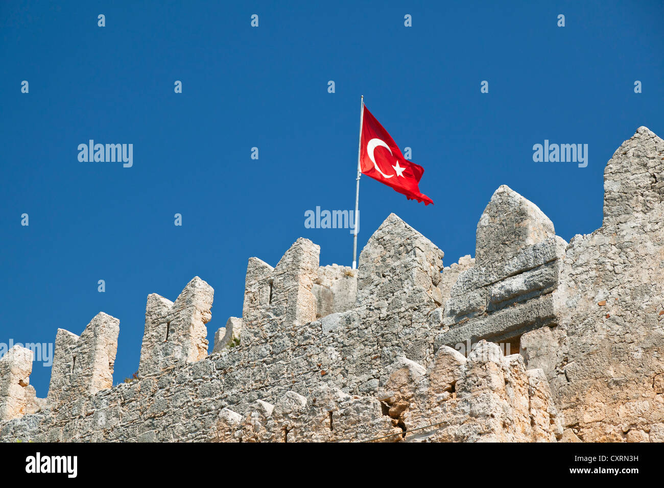 Byzantine castle of Kalekoey with a Turkish national flag, battlements ...