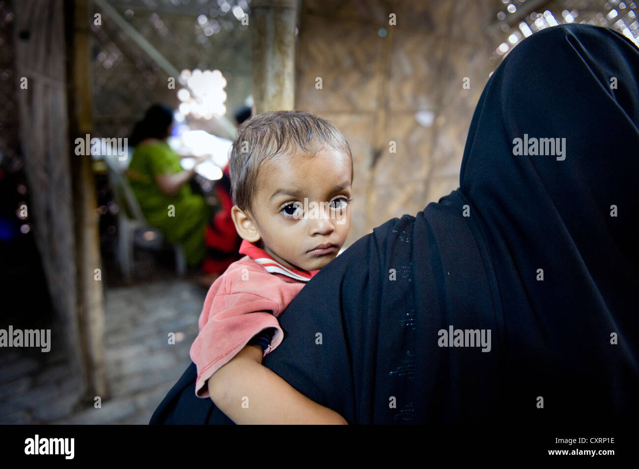 Woman in bamboo hut hi-res stock photography and images - Alamy