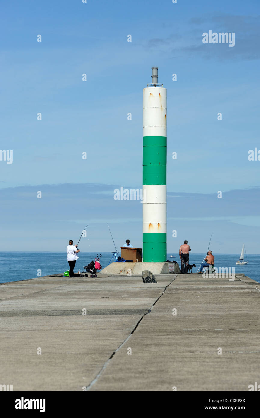 Lighthouse on concrete pier hi-res stock photography and images - Alamy