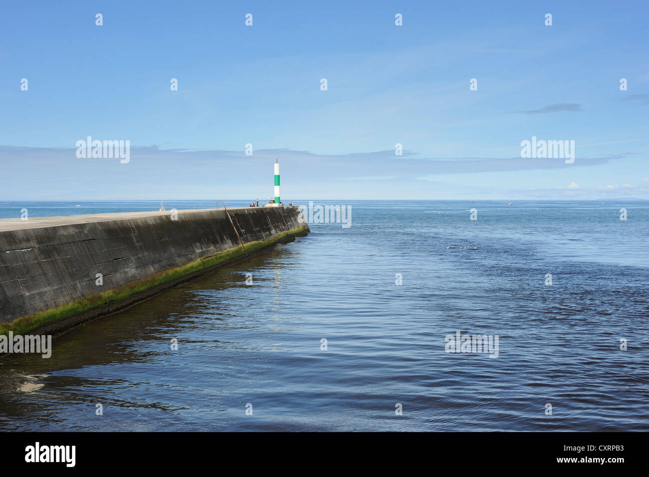 Aberystwyth's concrete pier & lighthouse Stock Photo - Alamy