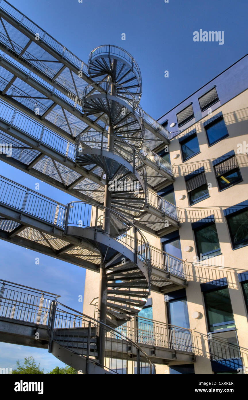 Modern office building, architecture, with a steel spiral staircase and ...