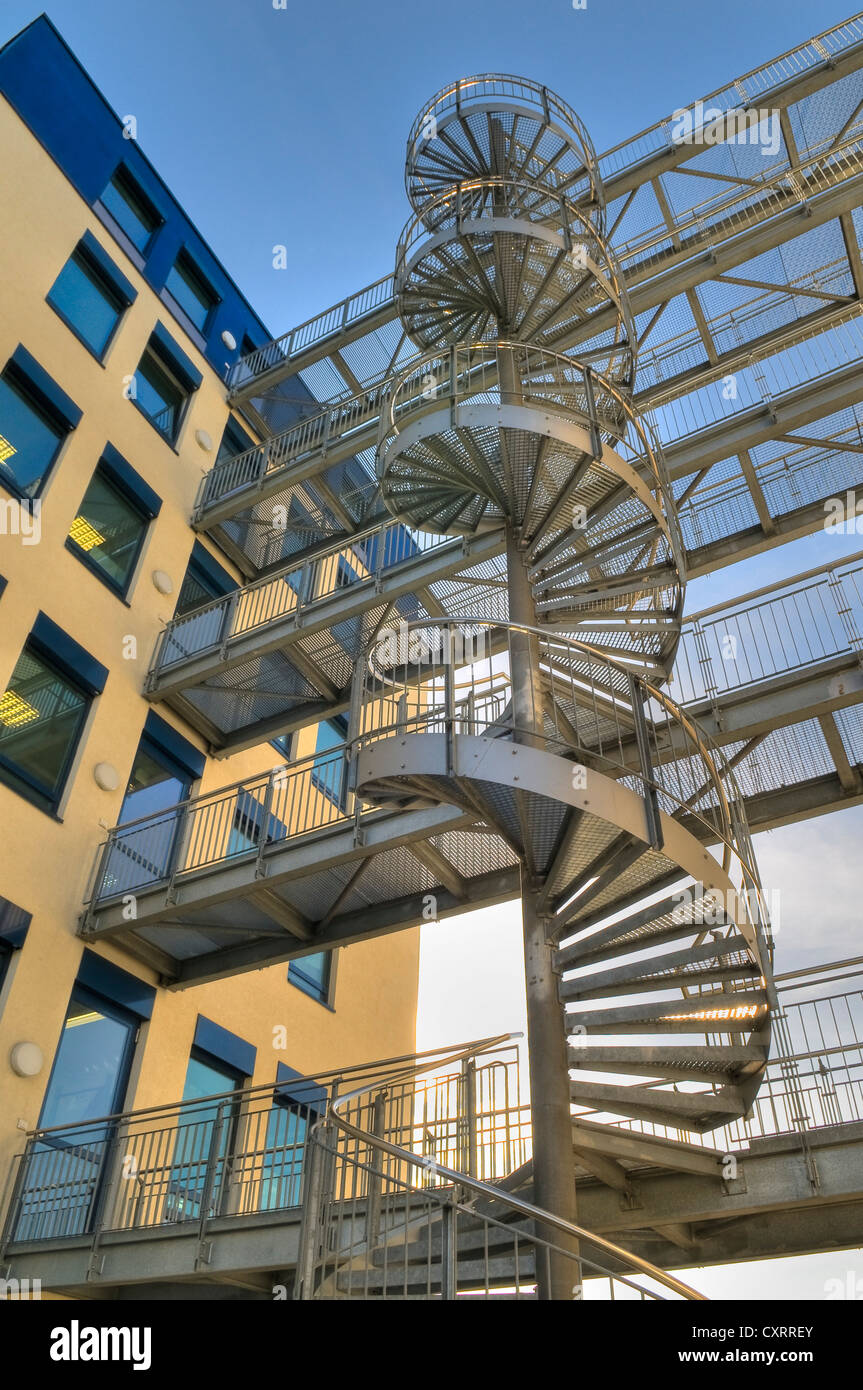 Modern office building, architecture, with a steel spiral staircase and ...