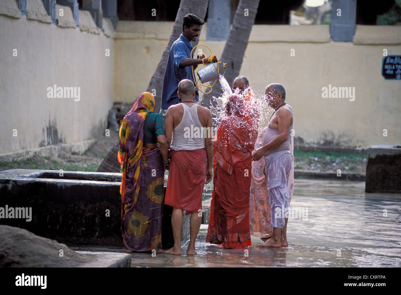 Pilgrims in a washing ritual with 22 stations around the Ramanathaswami ...