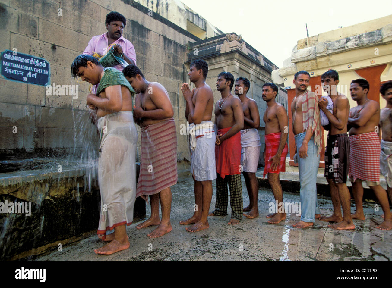 Pilgrims in a washing ritual with 22 stations around the Ramanathaswami ...