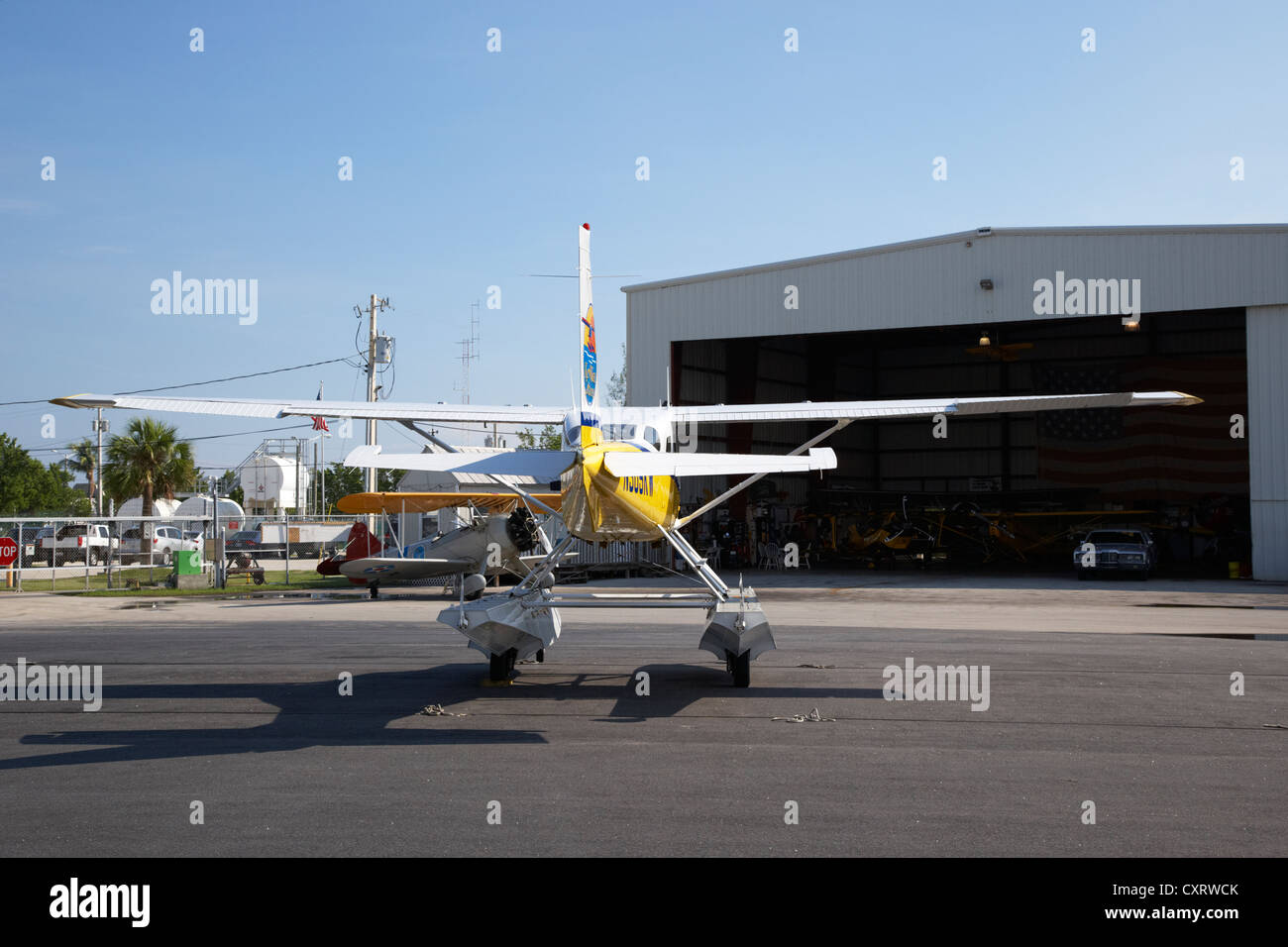 cessna u206g fixed wing single engine seaplane in front of hangar key ...