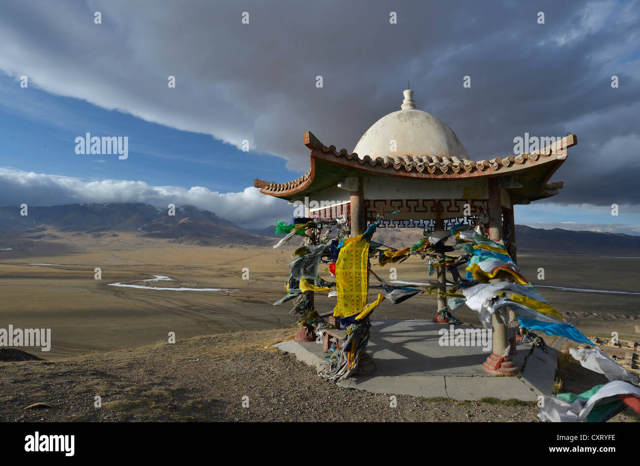 Chinese Mongolian pavilion adorned with Buddhist prayer flags flying in ...