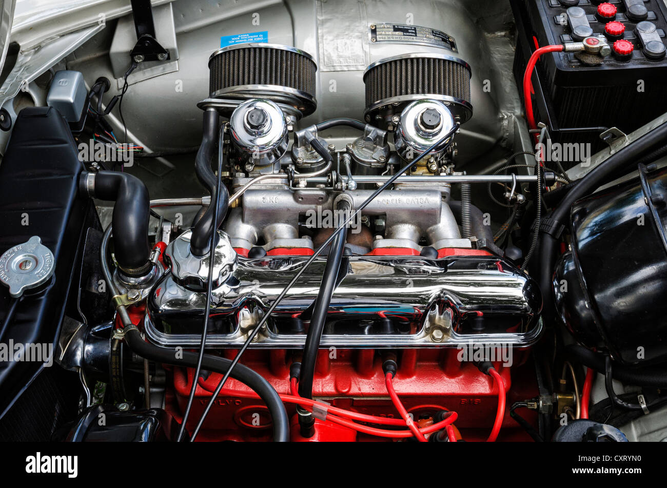 View of the engine compartment of a Volvo P1800S Pressed Steel, built ...
