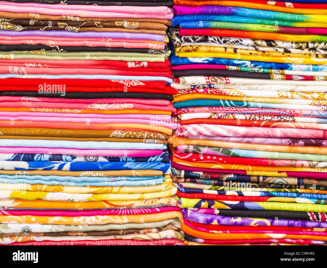 Cloth stacked up on sale in Phuket, Thailand Stock Photo - Alamy