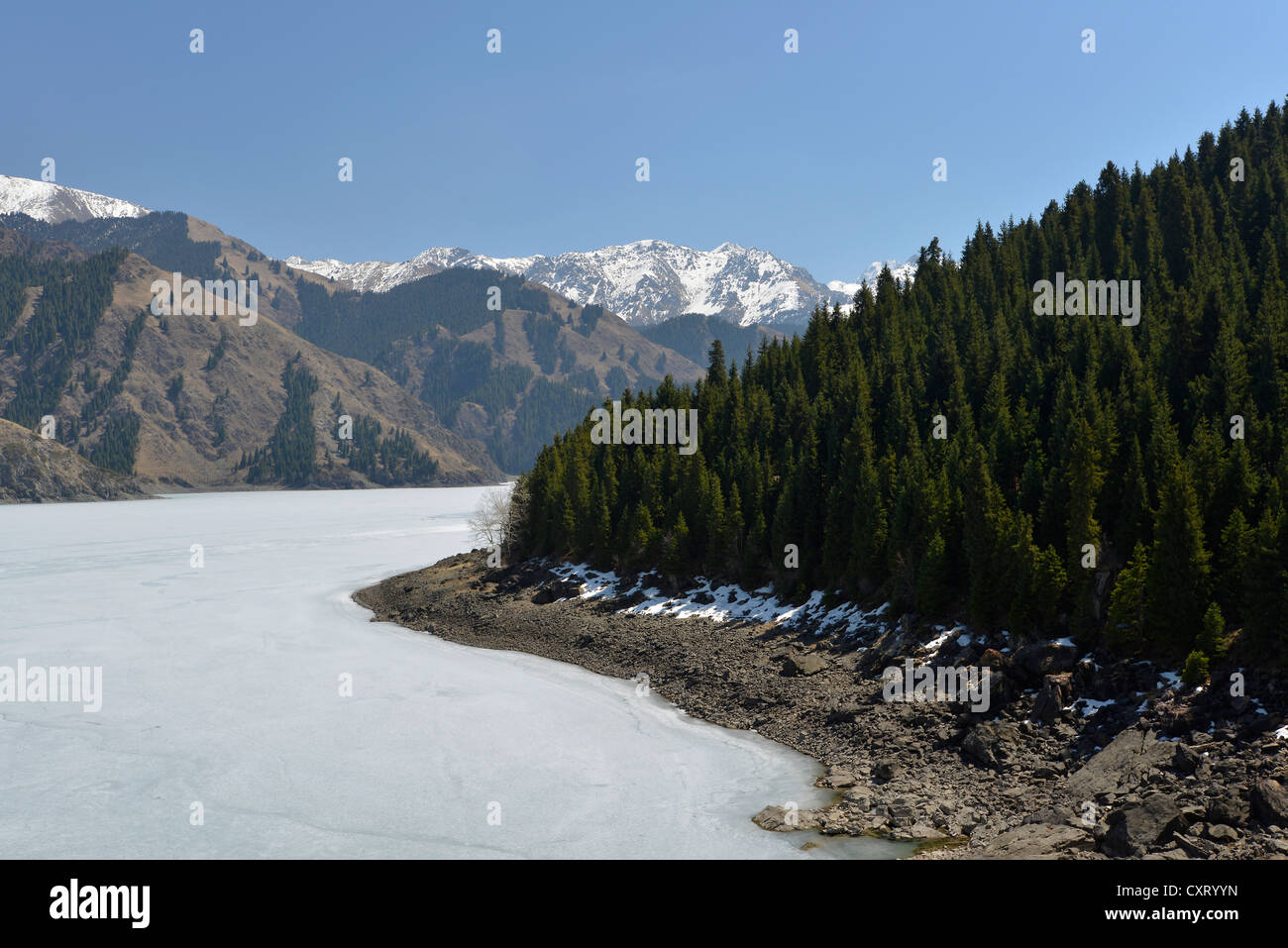 Frozen mountain lake Tian Chi, with Peak of God, 5445m, Bogeda Feng ...