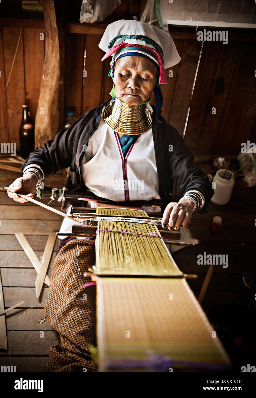 Old Kayan woman weaving, near Lake Inle, Burma also known as Myanmar ...