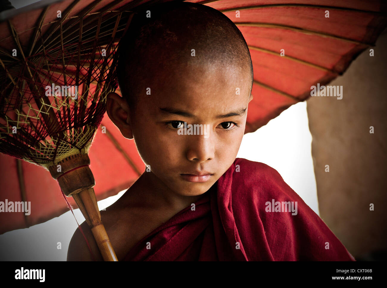 Novice monks with parasol hi-res stock photography and images - Alamy
