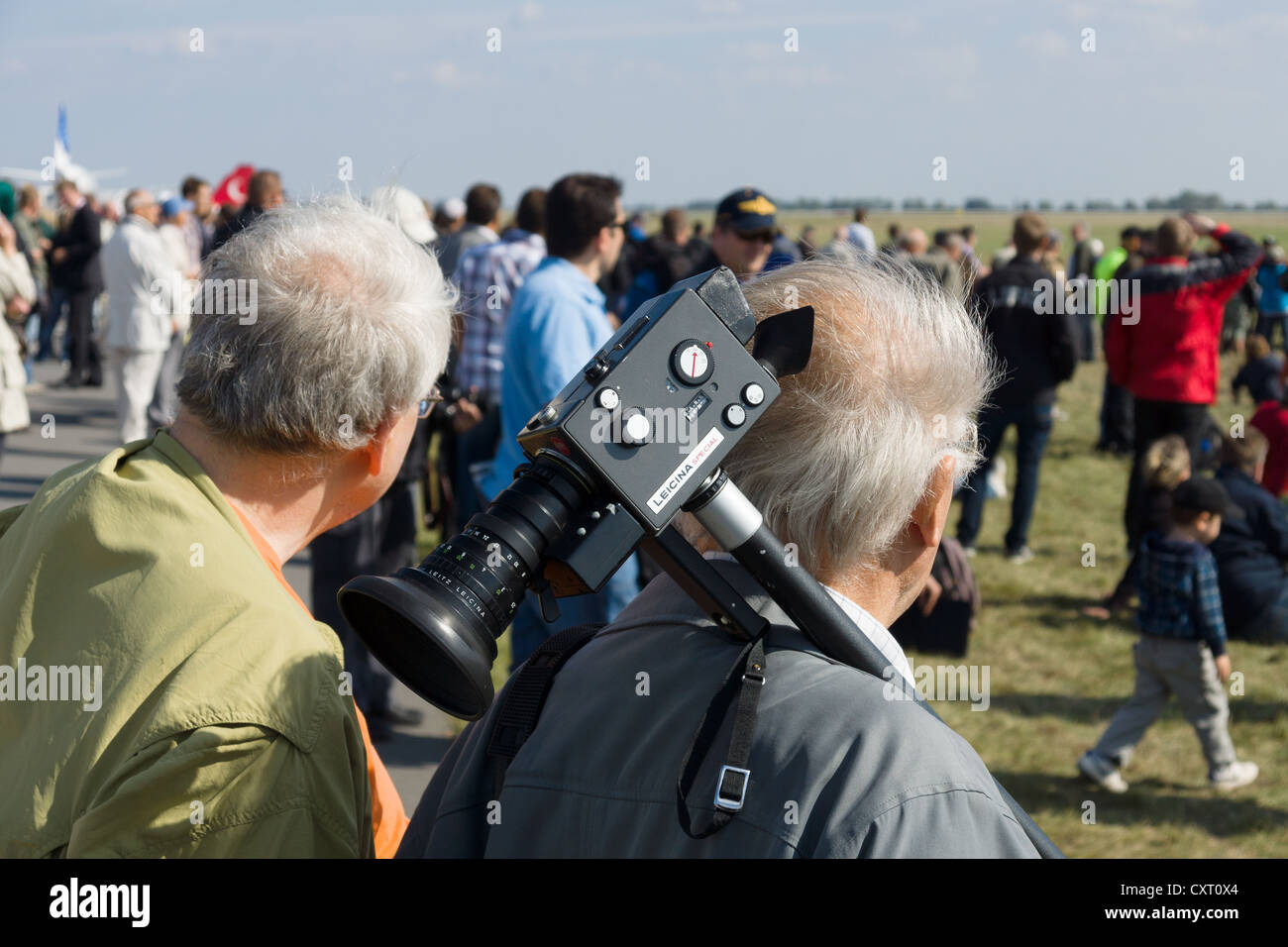 An elderly man with a movie camera Stock Photo - Alamy