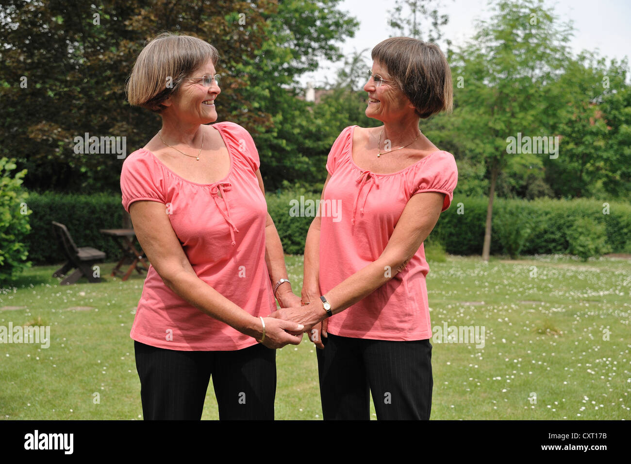 Happy family member holding hi-res stock photography and images - Alamy