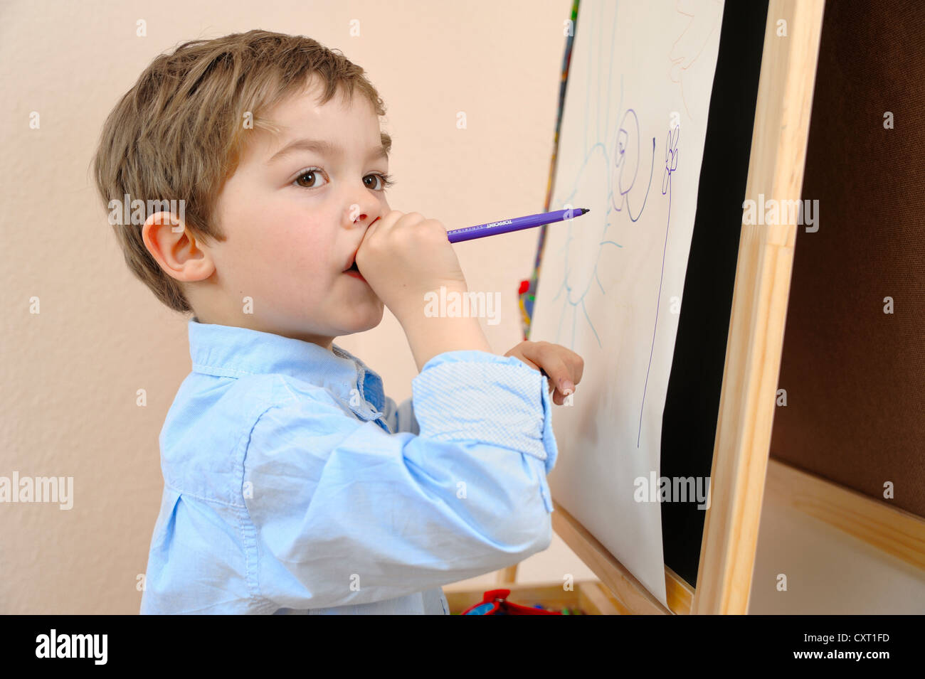 Human easel hi-res stock photography and images - Alamy