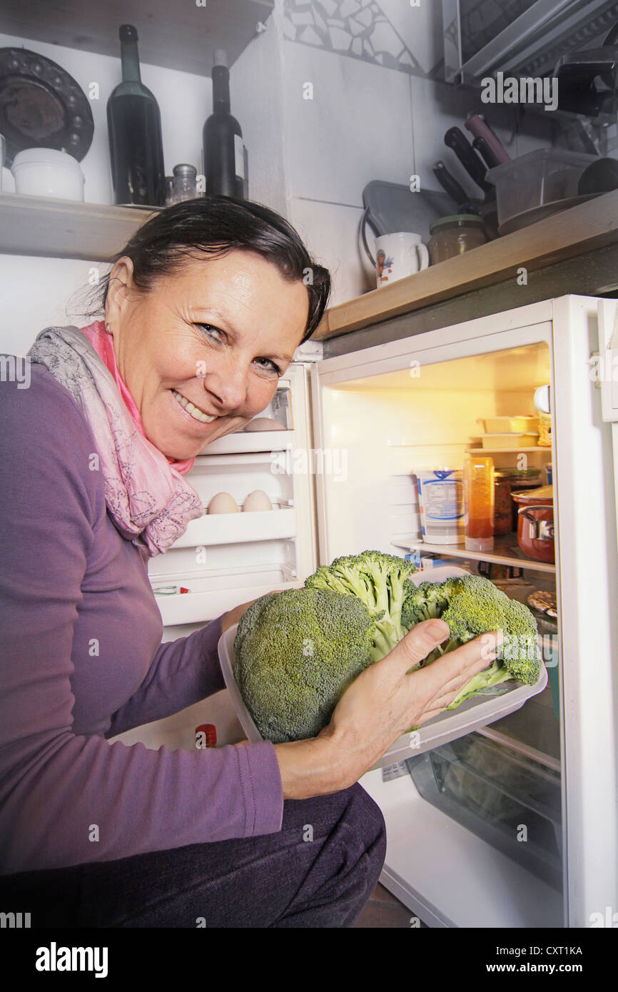 Woman taking product out hi-res stock photography and images - Alamy